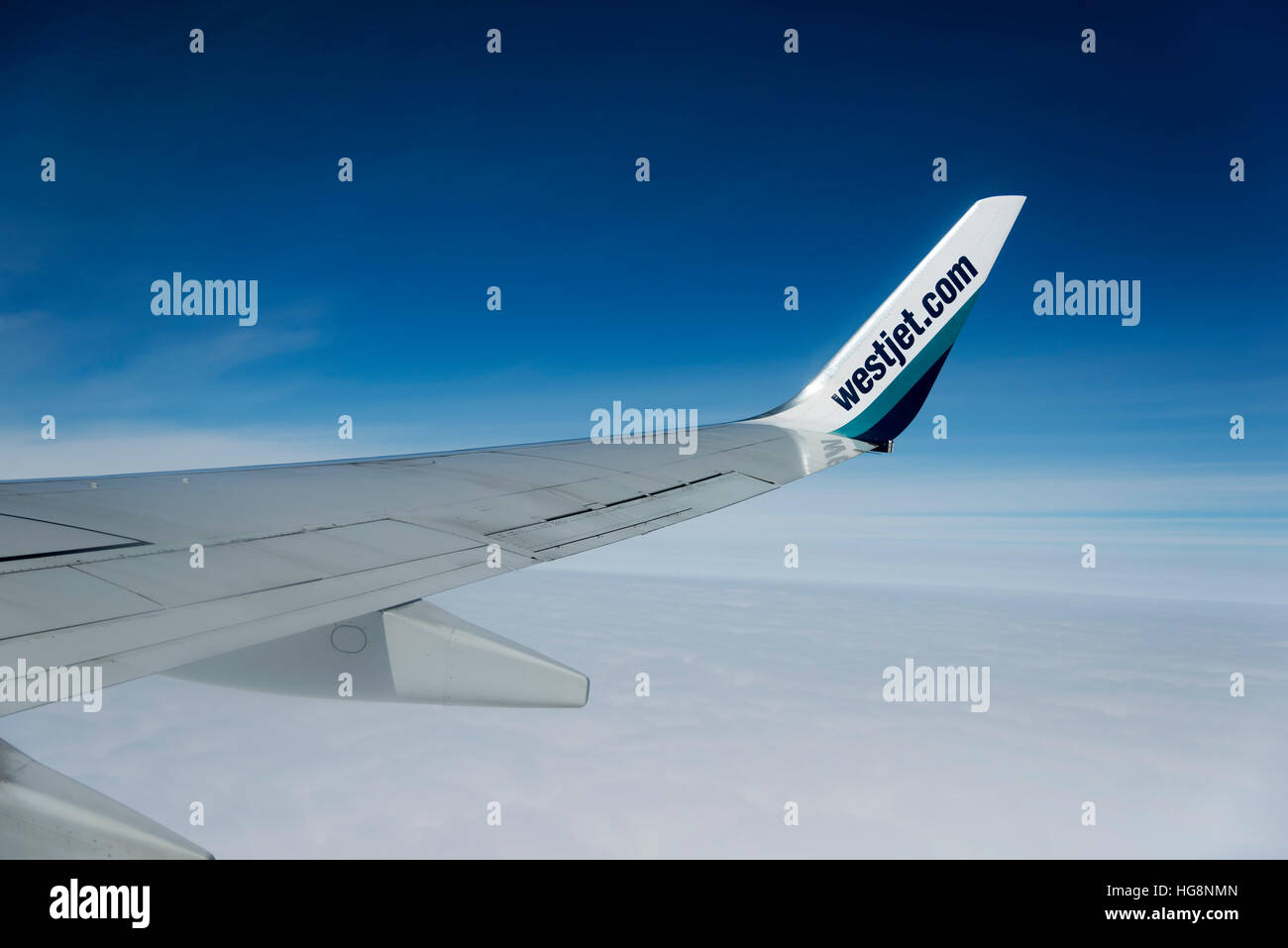 Westjet airplane wing Stock Photo - Alamy