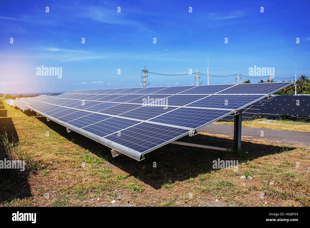 Solar panels on the lawn with blue sky Stock Photo - Alamy