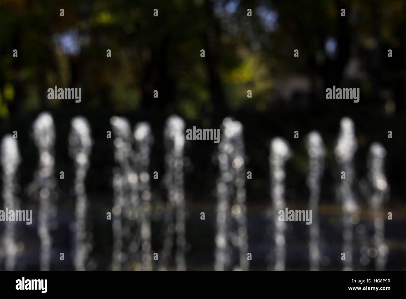 Fountain Splashing Water In The Park Stock Photo - Alamy