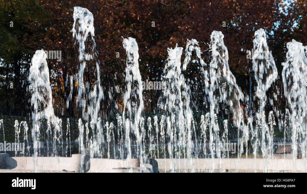 Fountain Splashing Water In The Park Stock Photo - Alamy