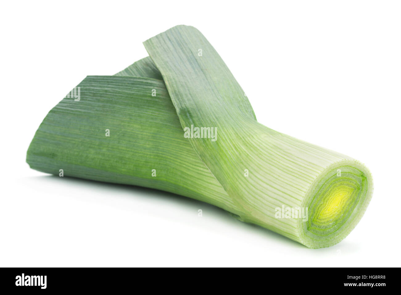 Leek vegetable closeup isolated on white background Stock Photo - Alamy