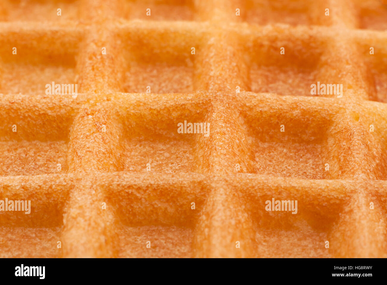 Sweet yellow wafers closeup detail background Stock Photo - Alamy