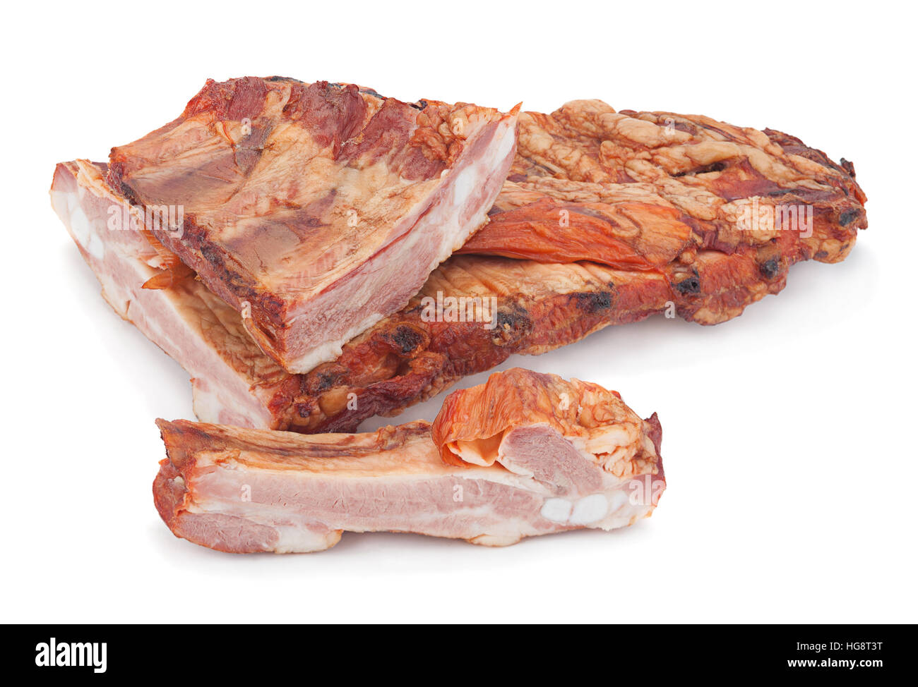 Smoked pork ribs isolated on white background Stock Photo - Alamy