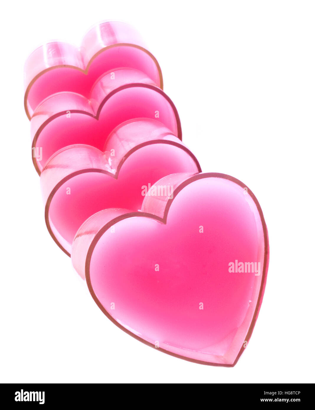 Pink hearts at row isolated on white background. Gel and glass Stock ...