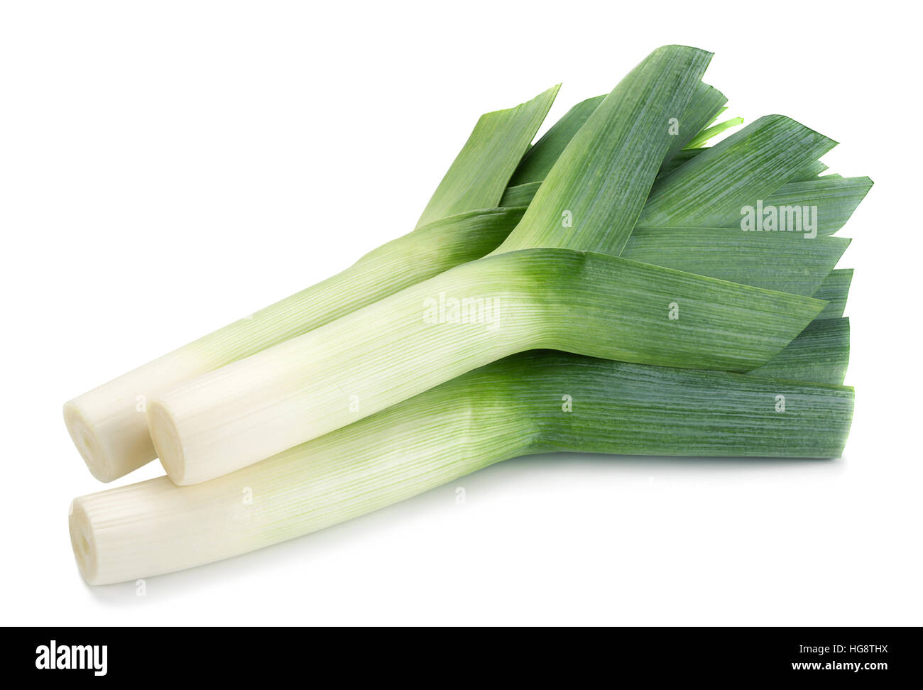 Leek vegetable closeup isolated on white background Stock Photo - Alamy