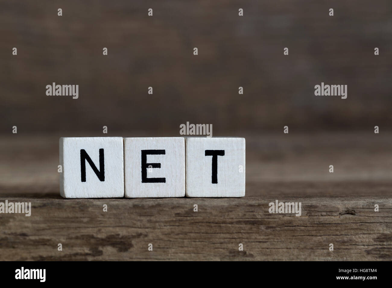 Net, written in cubes on wooden background Stock Photo - Alamy