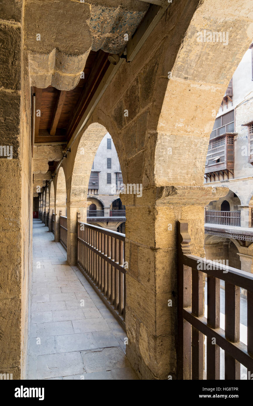 Angled view of one arch with interleaved wooden balustrades at the ...