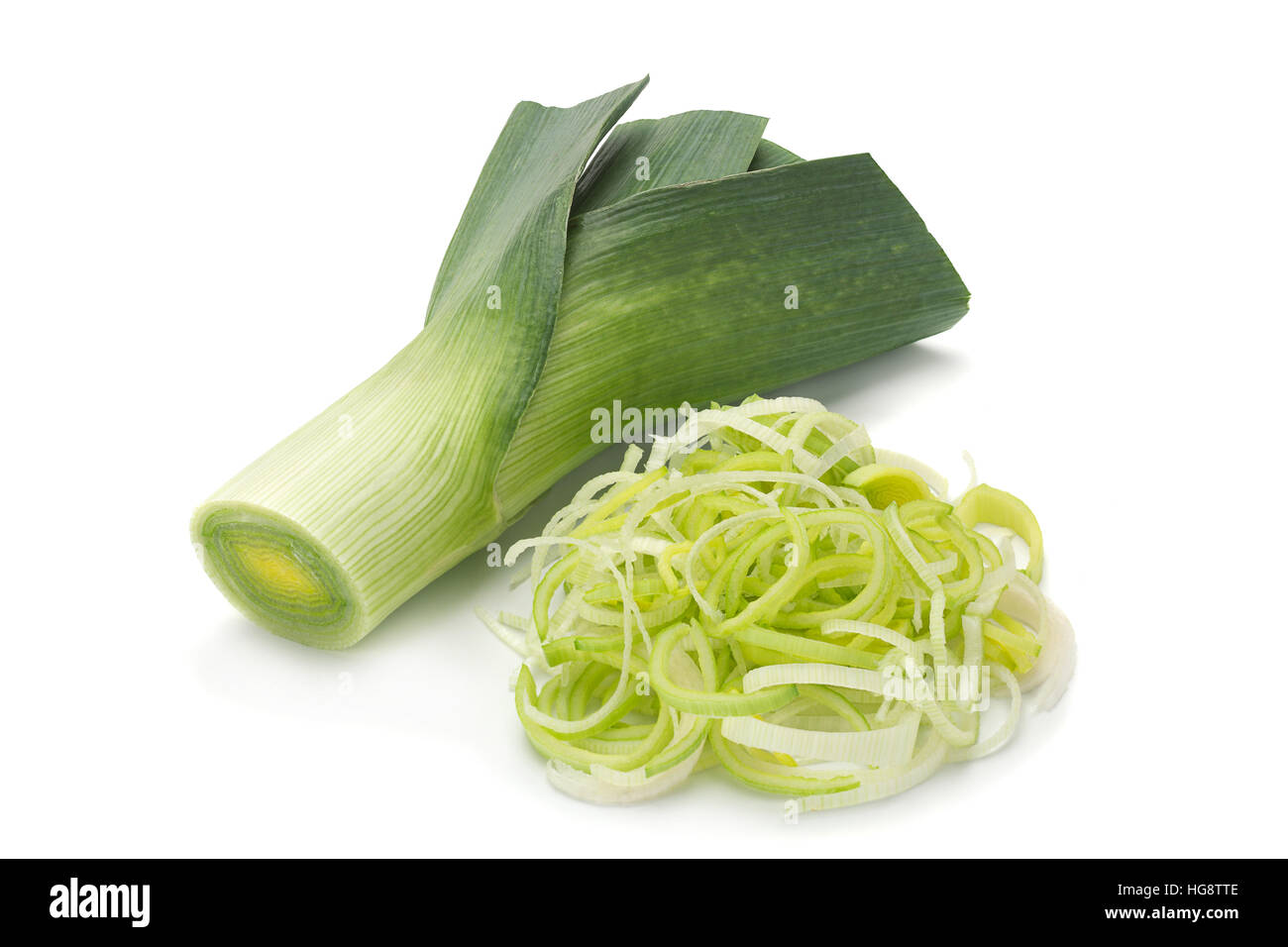 Leek vegetable closeup isolated on white background Stock Photo - Alamy