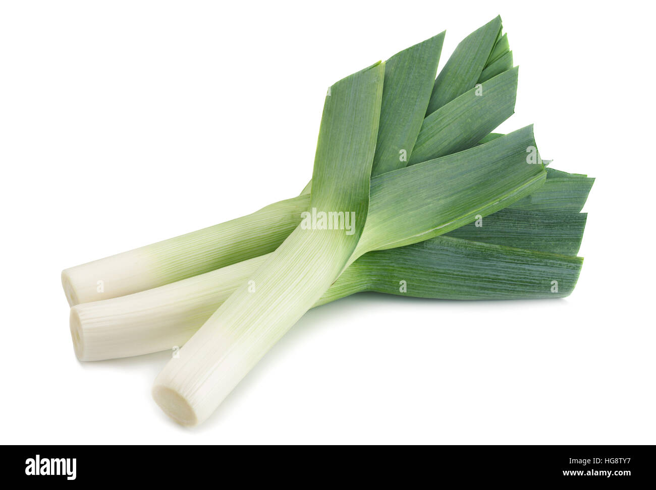 Leek vegetable closeup isolated on white background Stock Photo - Alamy