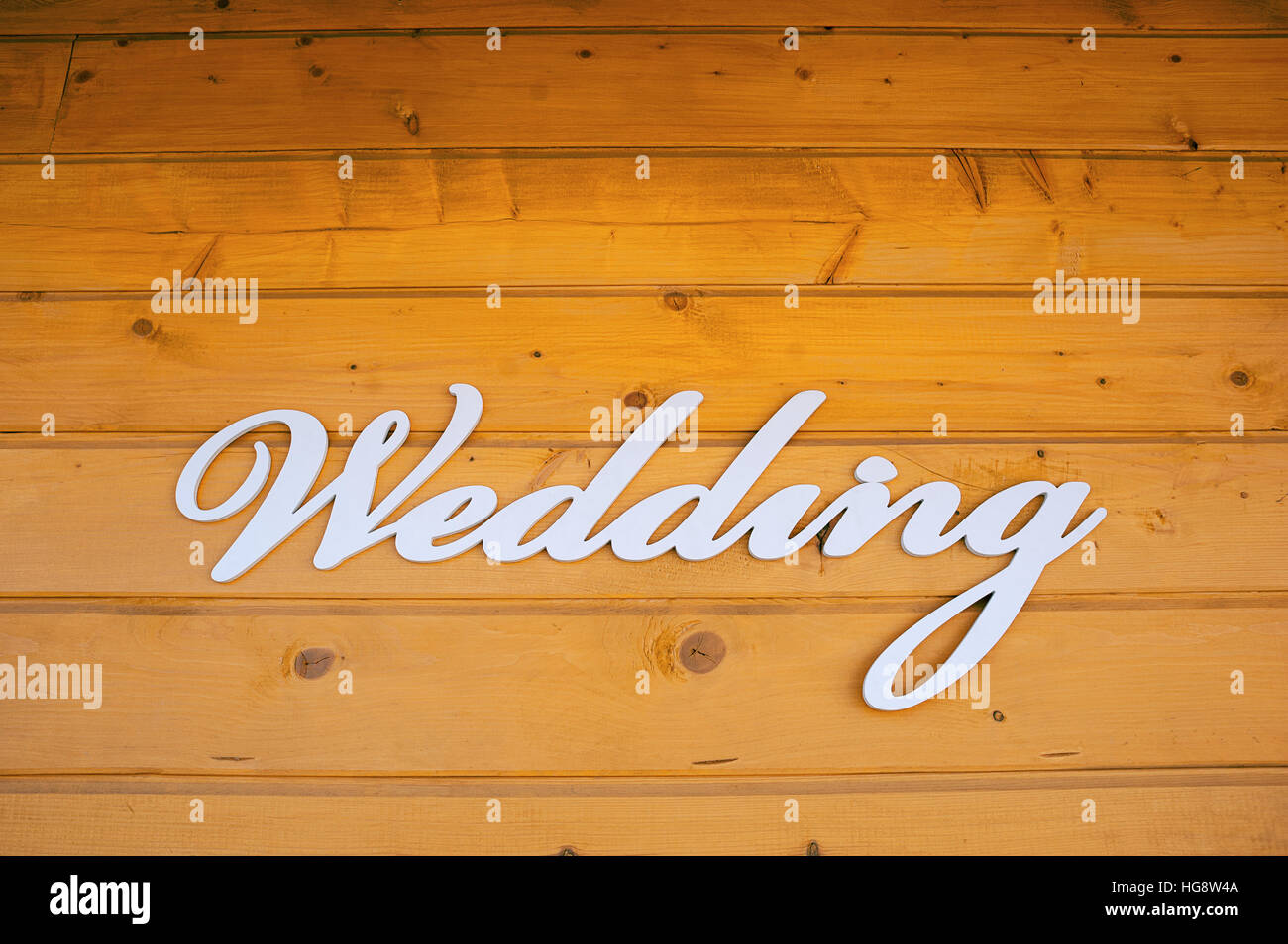 Wedding Ceremony sign on the wall of a wooden house Stock Photo - Alamy