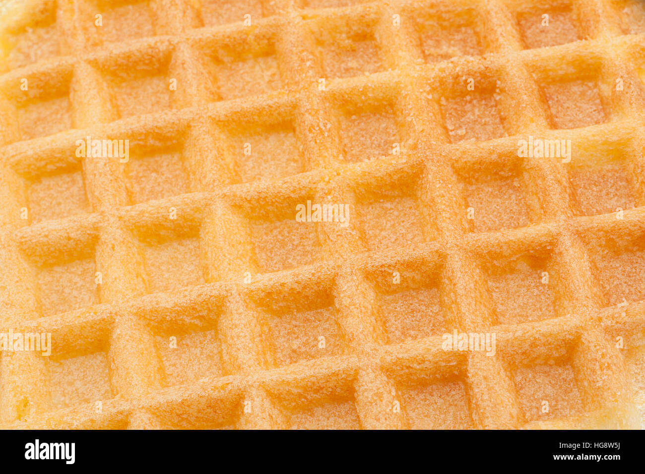 Sweet yellow wafers closeup detail background Stock Photo - Alamy