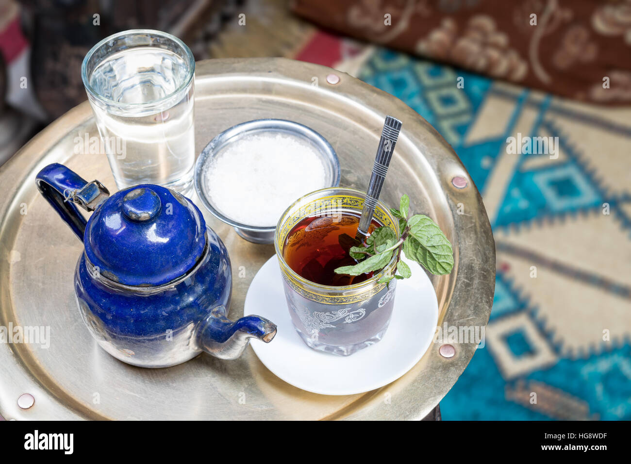 Traditional mint tea set on copper table in an oriental cafe at Khan El ...