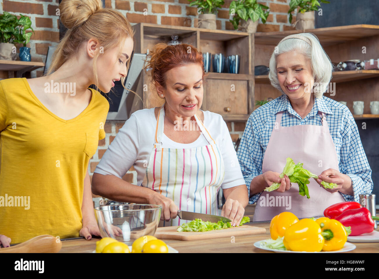 Family cooking kitchen generation hi-res stock photography and images ...