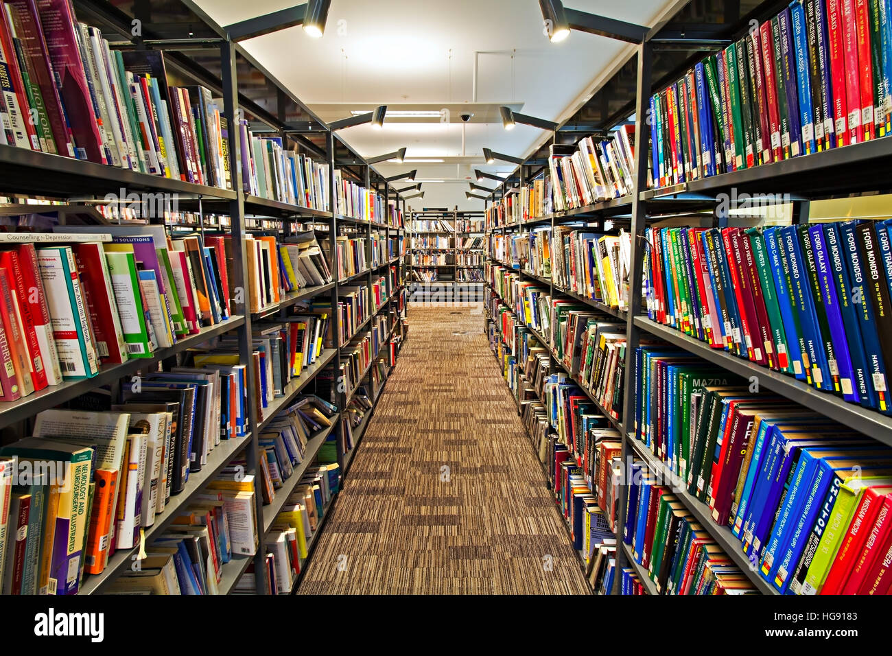 Bookshelves in a public library Stock Photo - Alamy