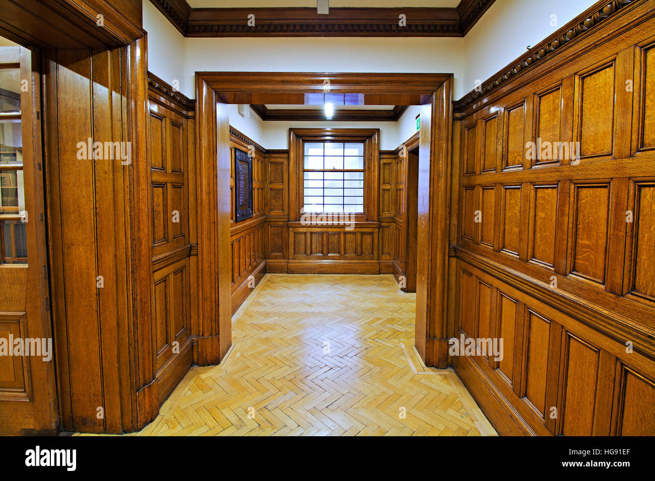 Oak paneled walls and sliding sash window Stock Photo - Alamy
