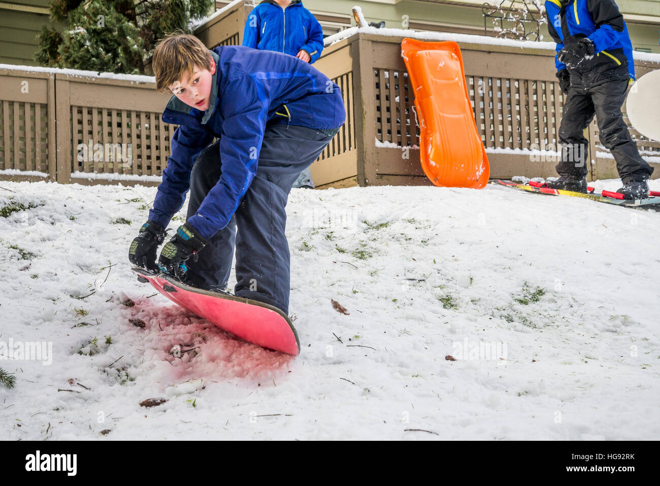 Snow Fun Kids Sledding High Resolution Stock Photography and Images - Alamy