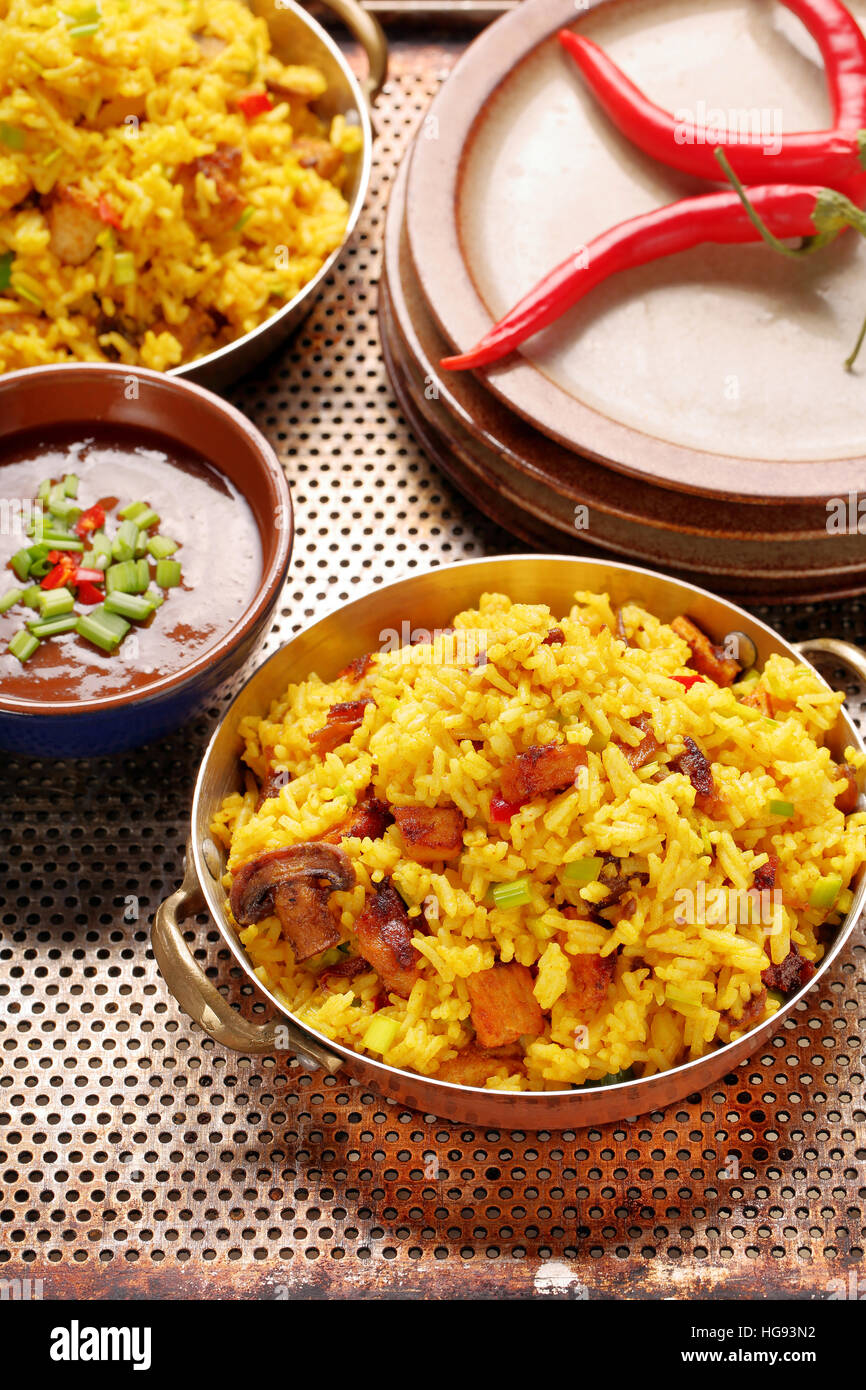 Chicken with basmati rice fried in stainless pan Stock Photo - Alamy