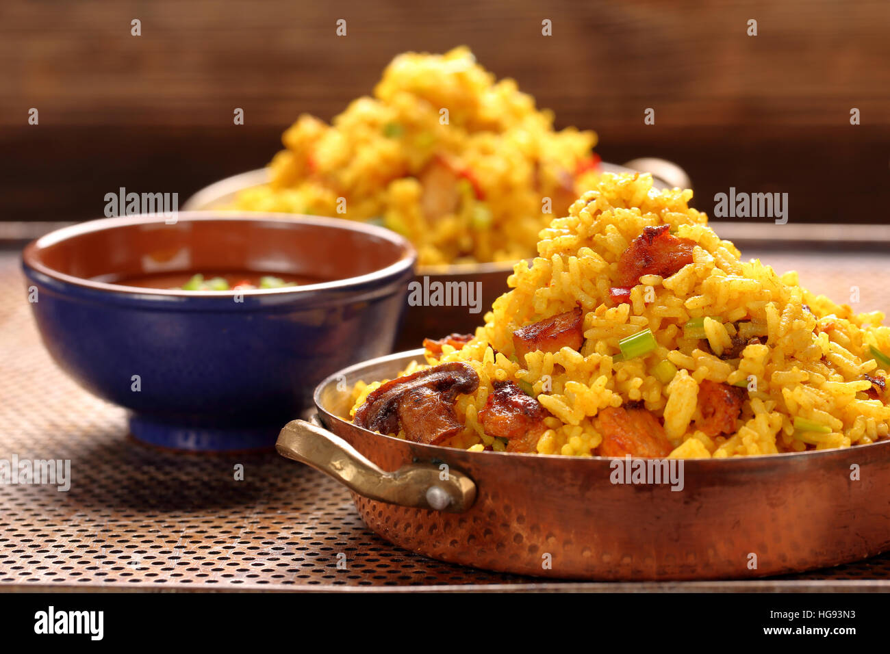 Chicken with basmati rice fried in stainless pan Stock Photo - Alamy