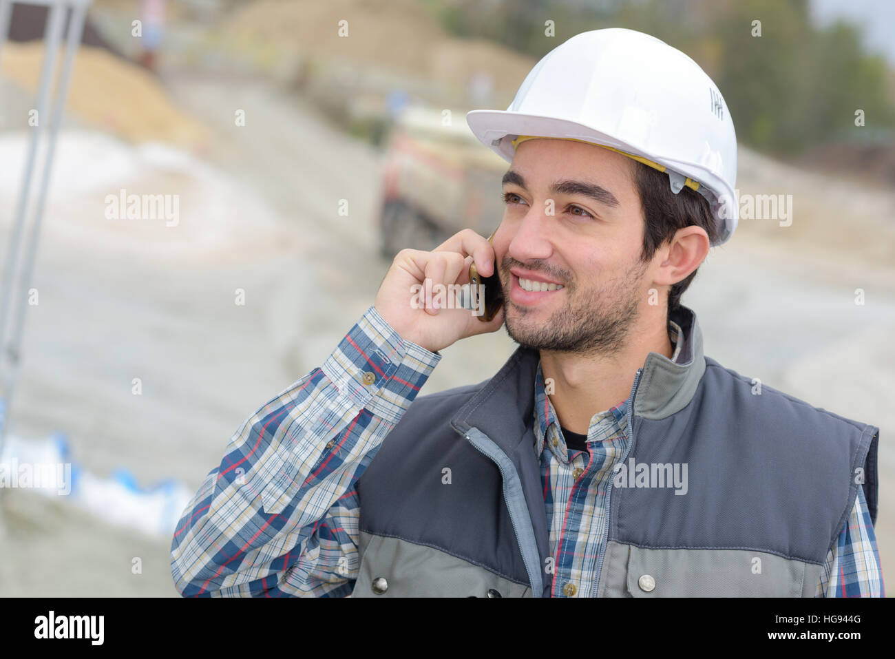 engineer having a mobile conversation Stock Photo - Alamy