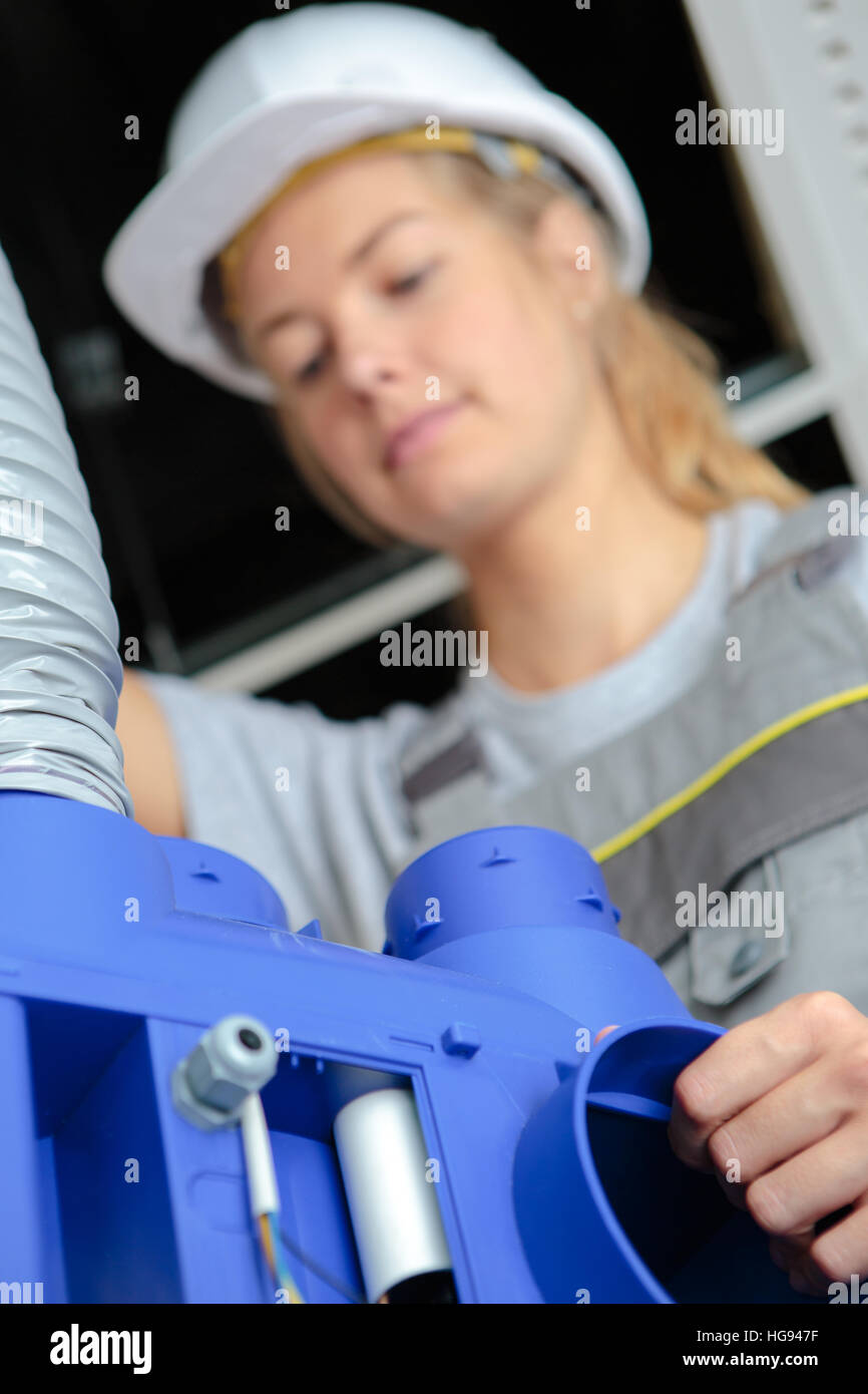 Worker operating machine in hi-res stock photography and images - Alamy