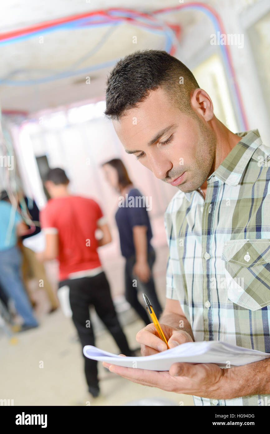 man taking notes Stock Photo - Alamy