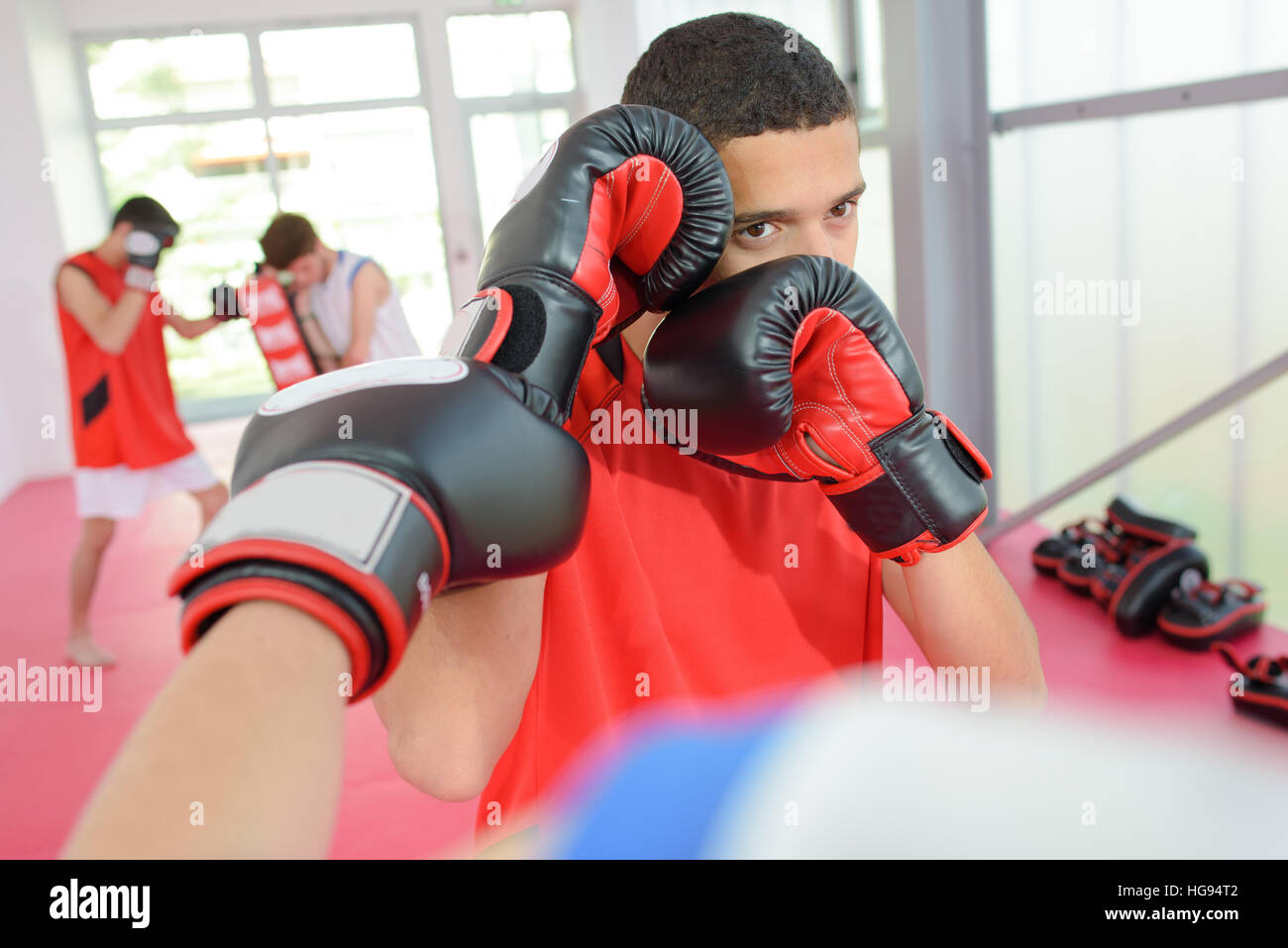 Boxing coach and teenager hi-res stock photography and images - Alamy