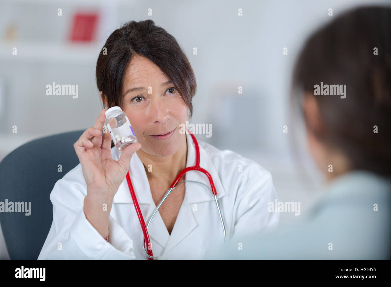 showing the medicine Stock Photo - Alamy
