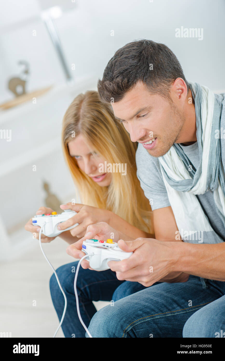 playing video game Stock Photo - Alamy