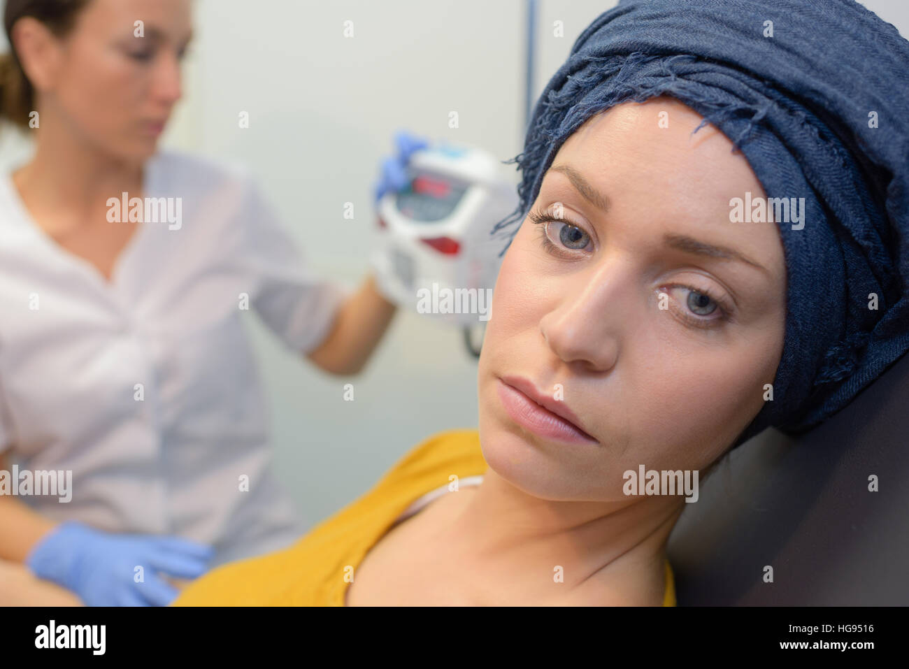 a sad patient under treatment Stock Photo - Alamy