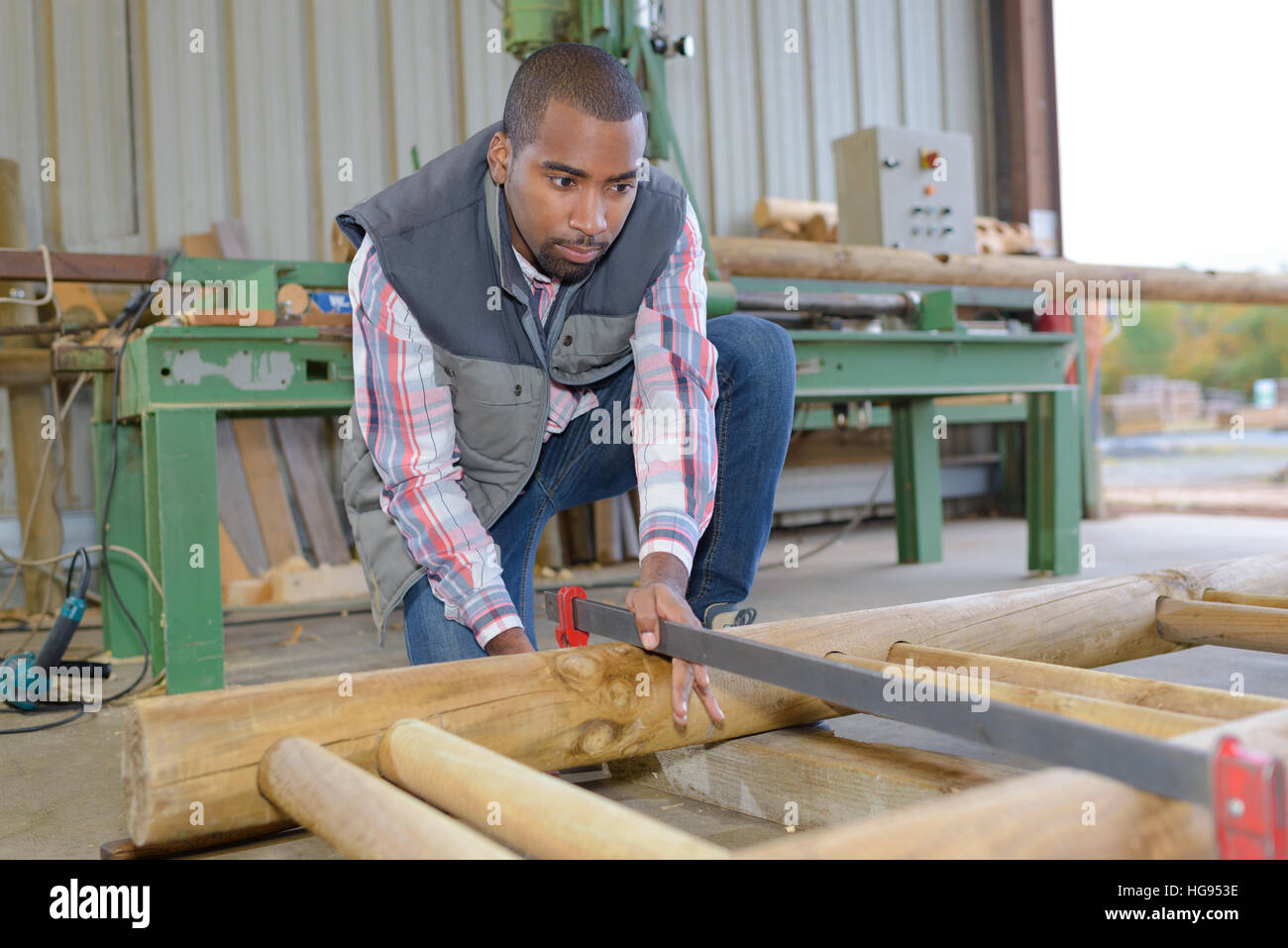 worker measuring a frame Stock Photo - Alamy