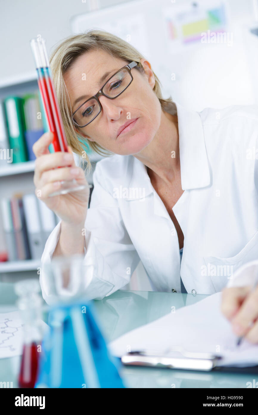 female medical technician working in laboratory Stock Photo - Alamy