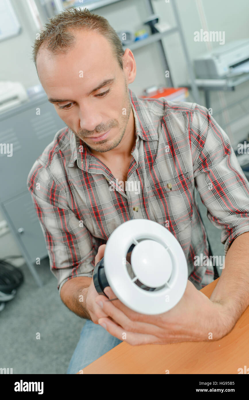 Man holding vent Stock Photo - Alamy