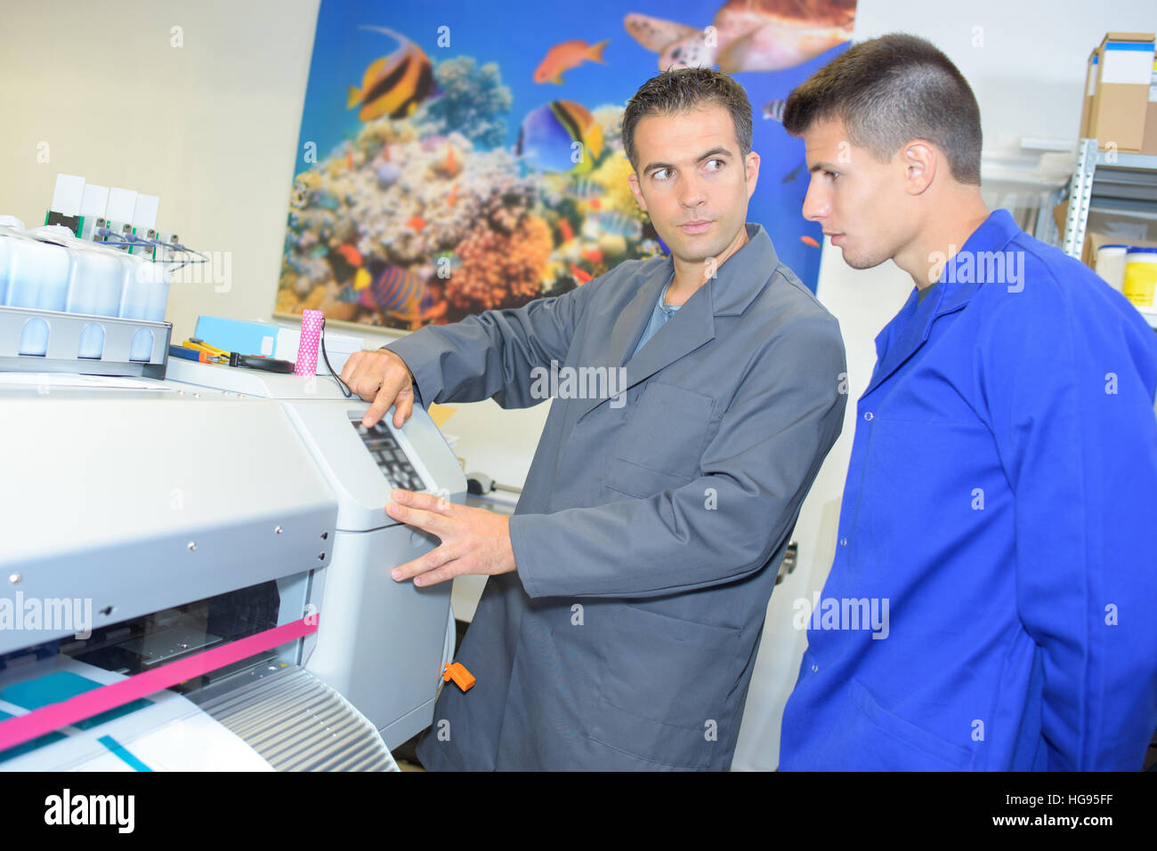 printer technicians in the office Stock Photo - Alamy