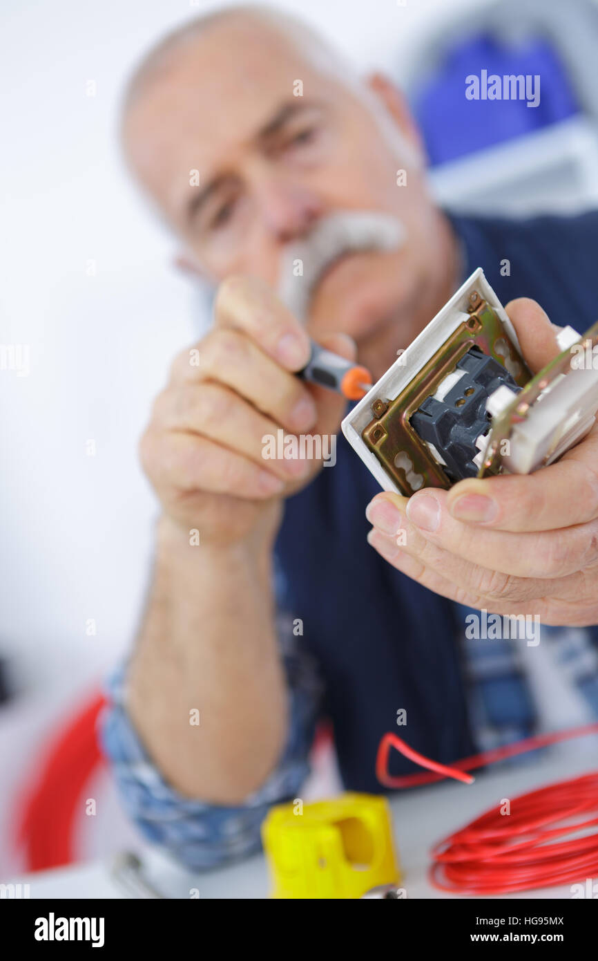 Senior repair tech tests hi-res stock photography and images - Alamy