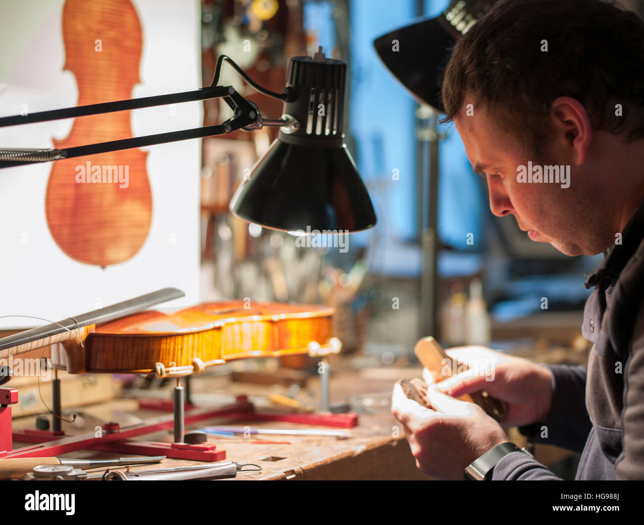 Master Luthier Vladimiro Cubanzi at work in his laboratory in Cremona ...