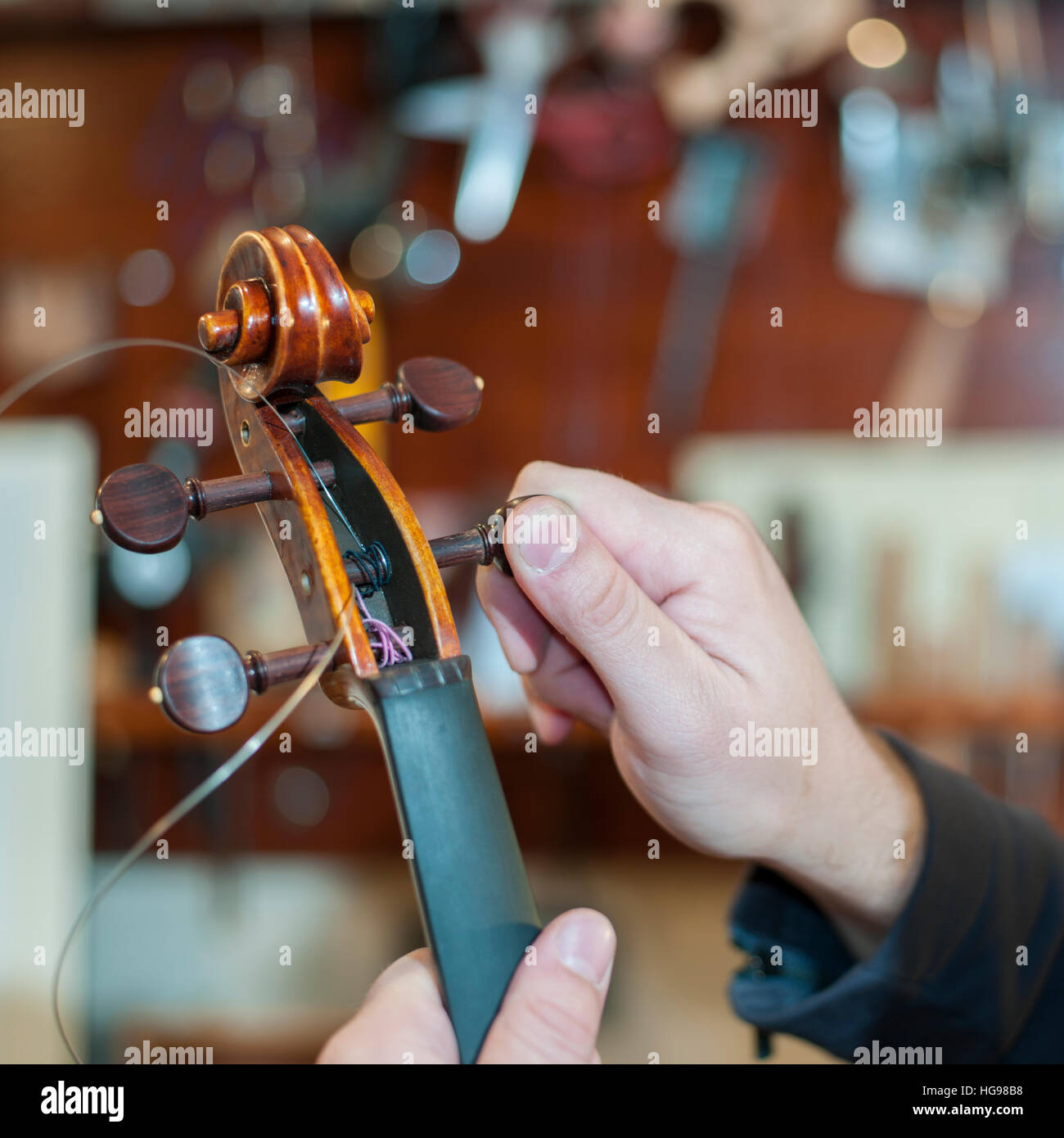 Master Luthier Vladimiro Cubanzi at work in his laboratory in Cremona ...