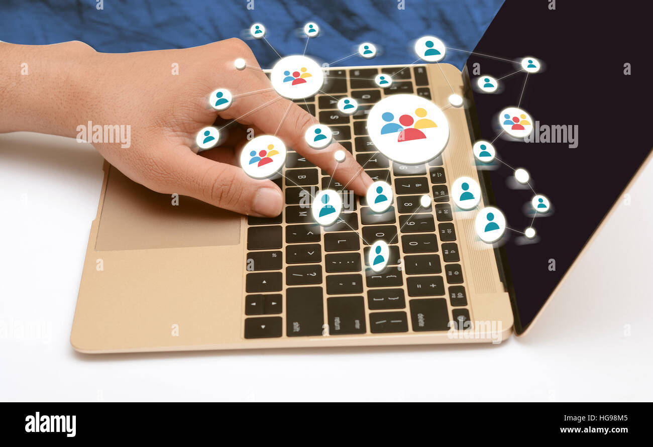 Networking social icons on laptop with professional touching Stock ...