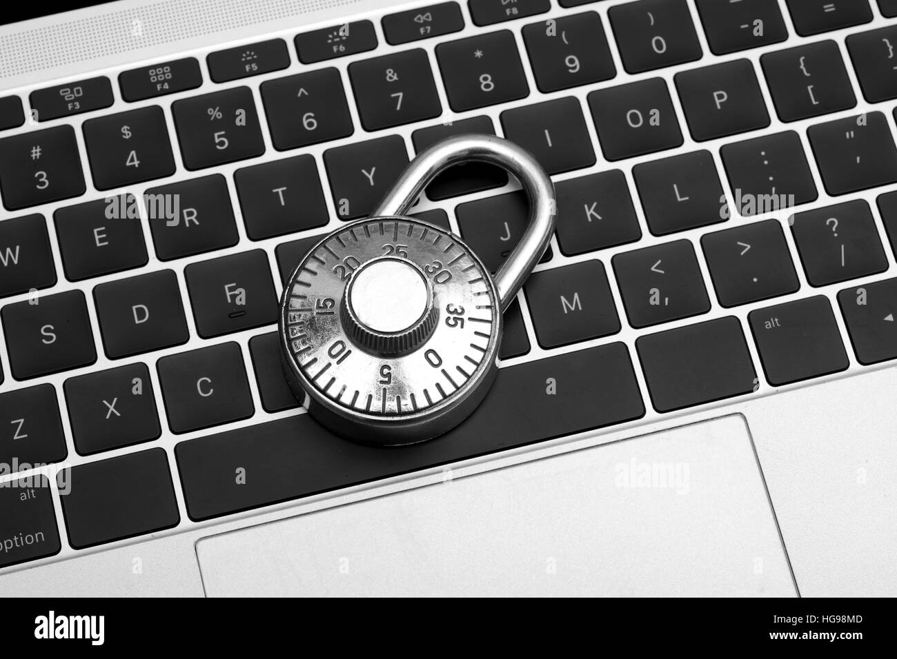 Padlock on Laptop Keyboard close up Stock Photo - Alamy