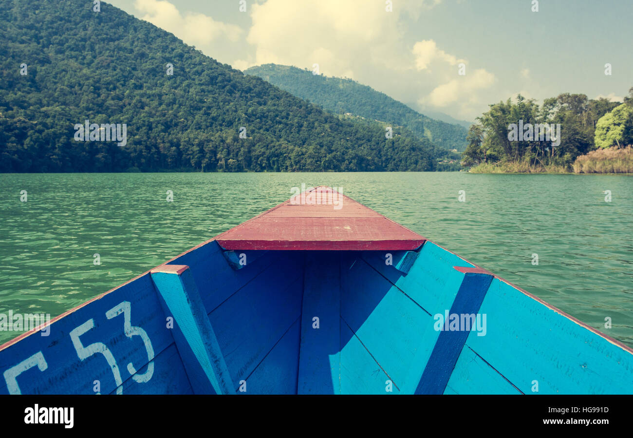 Boat ride across tropical river Stock Photo - Alamy