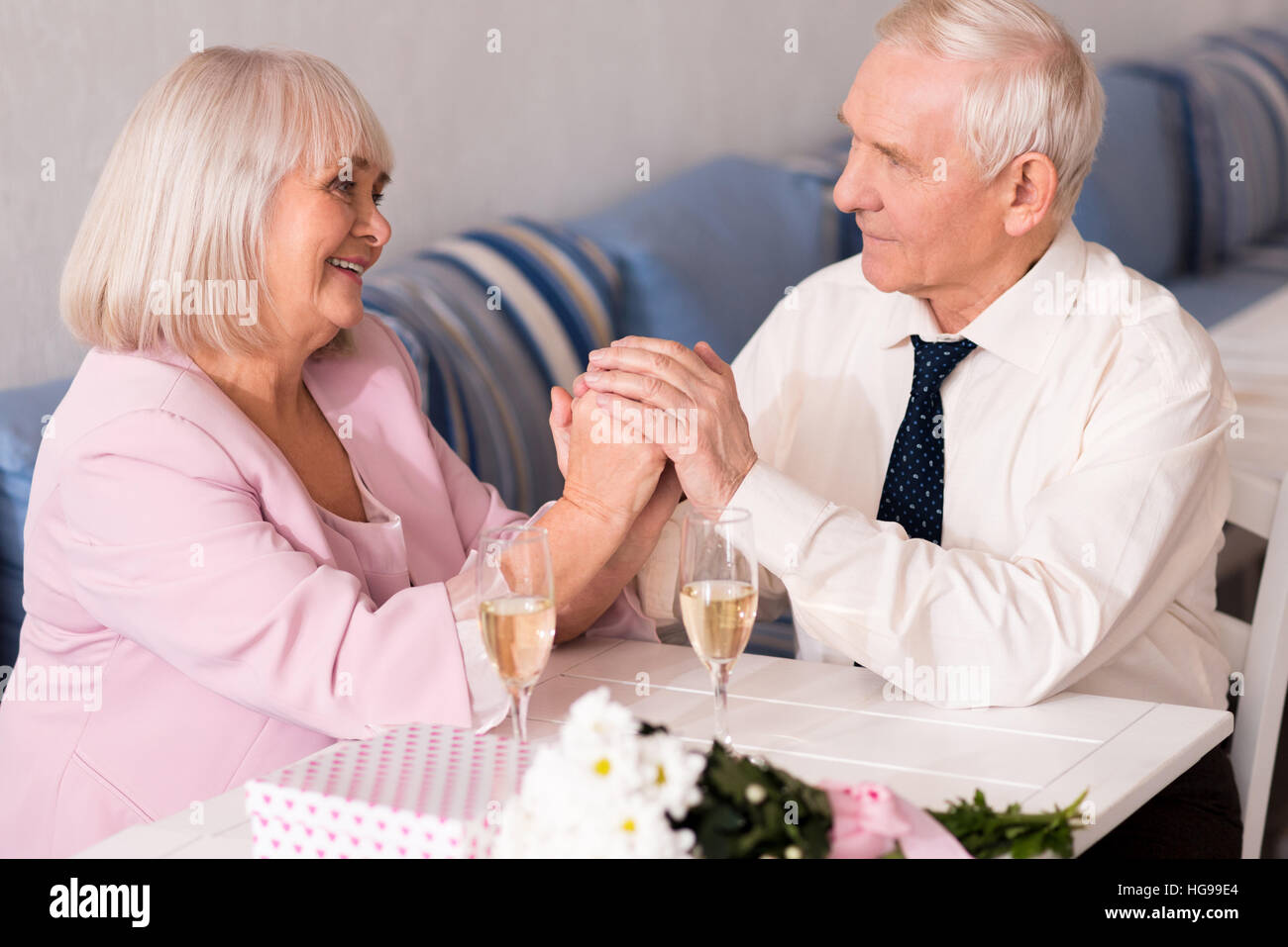 Gorgeous elderly couple holding hands Stock Photo - Alamy