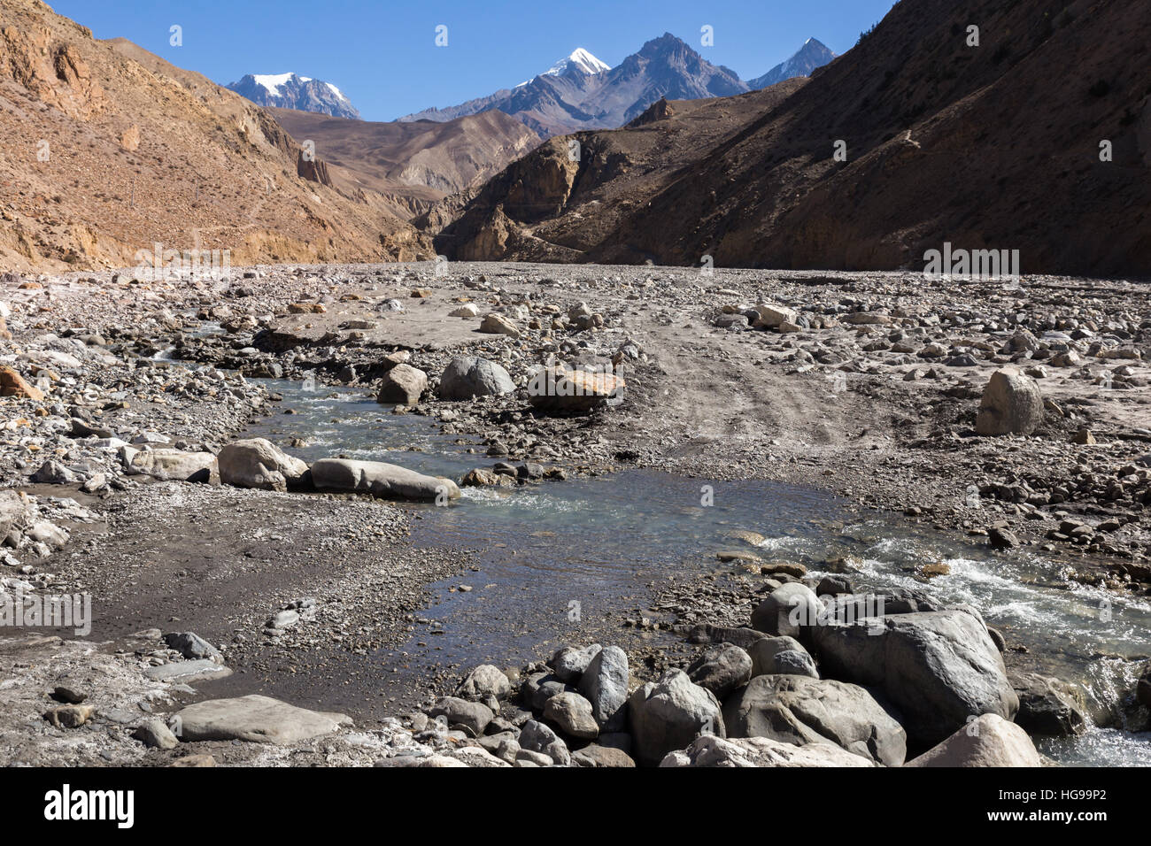 road over a stream in mountain gorge, Himalaya Stock Photo - Alamy