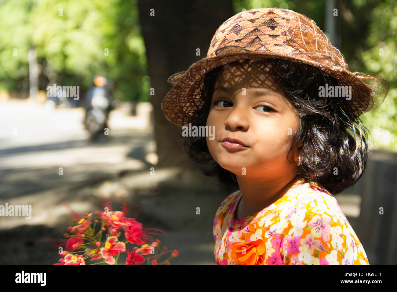 Indian girl wearing hat hi-res stock photography and images - Alamy