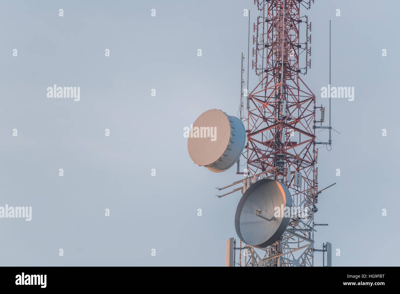 Telecommunication tower Antenna at cloudy sky Stock Photo - Alamy