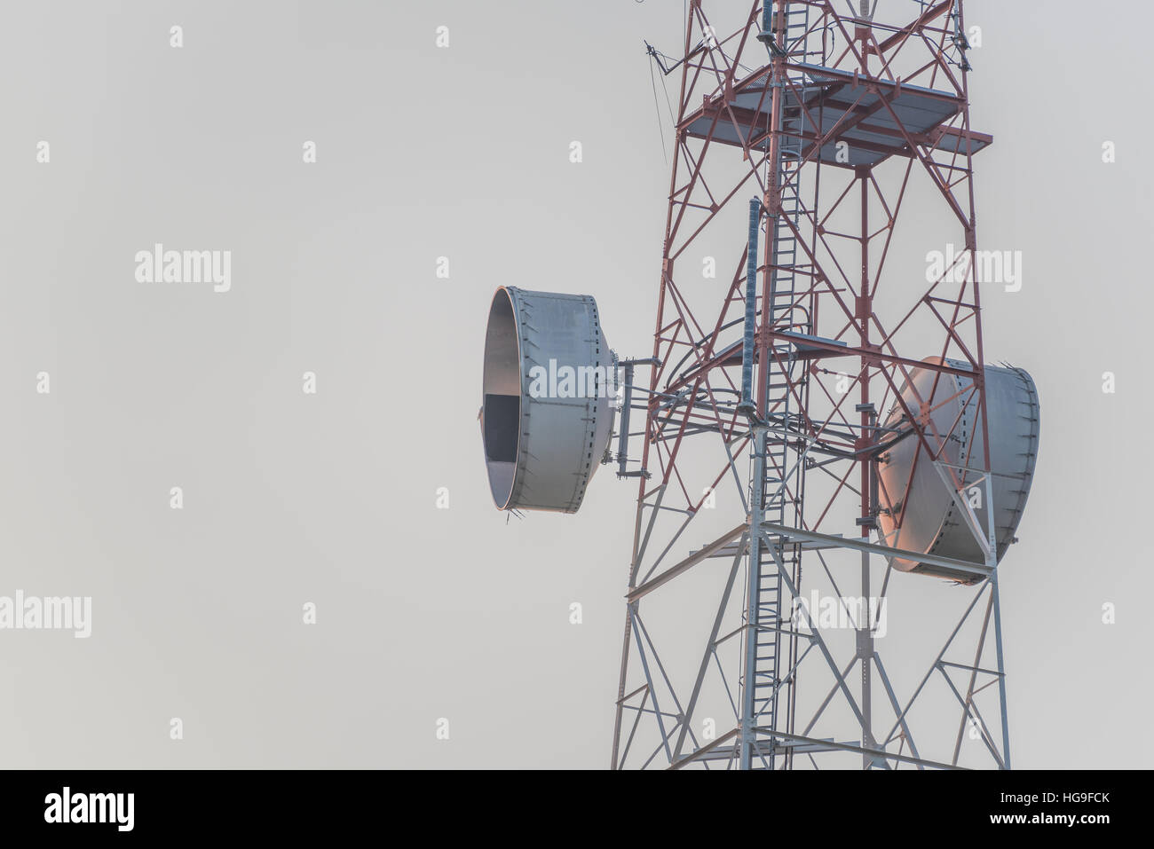 Telecommunication tower Antenna at cloudy sky Stock Photo - Alamy