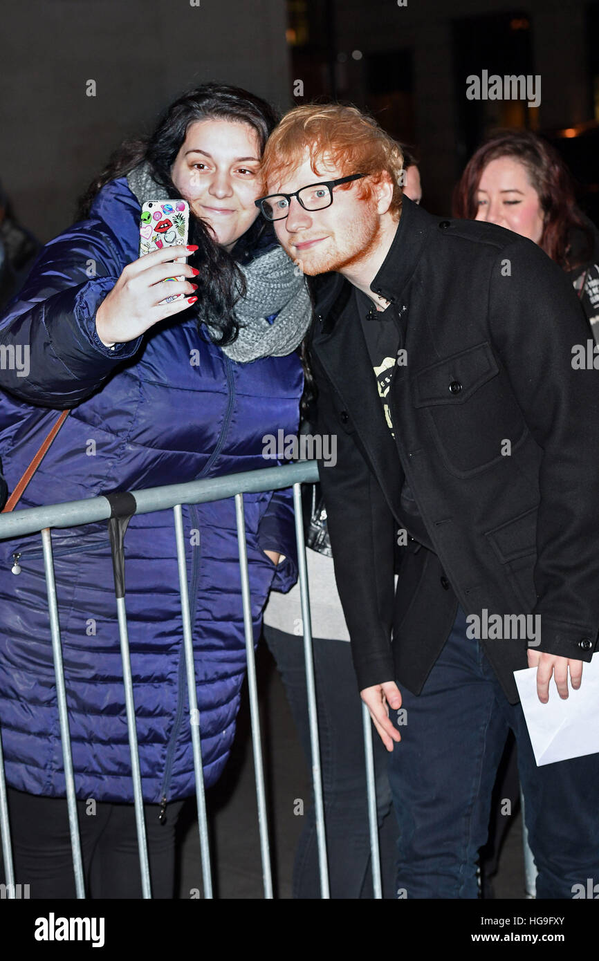Ed Sheeran poses with fans outside the BBC Broadcasting House, London ...