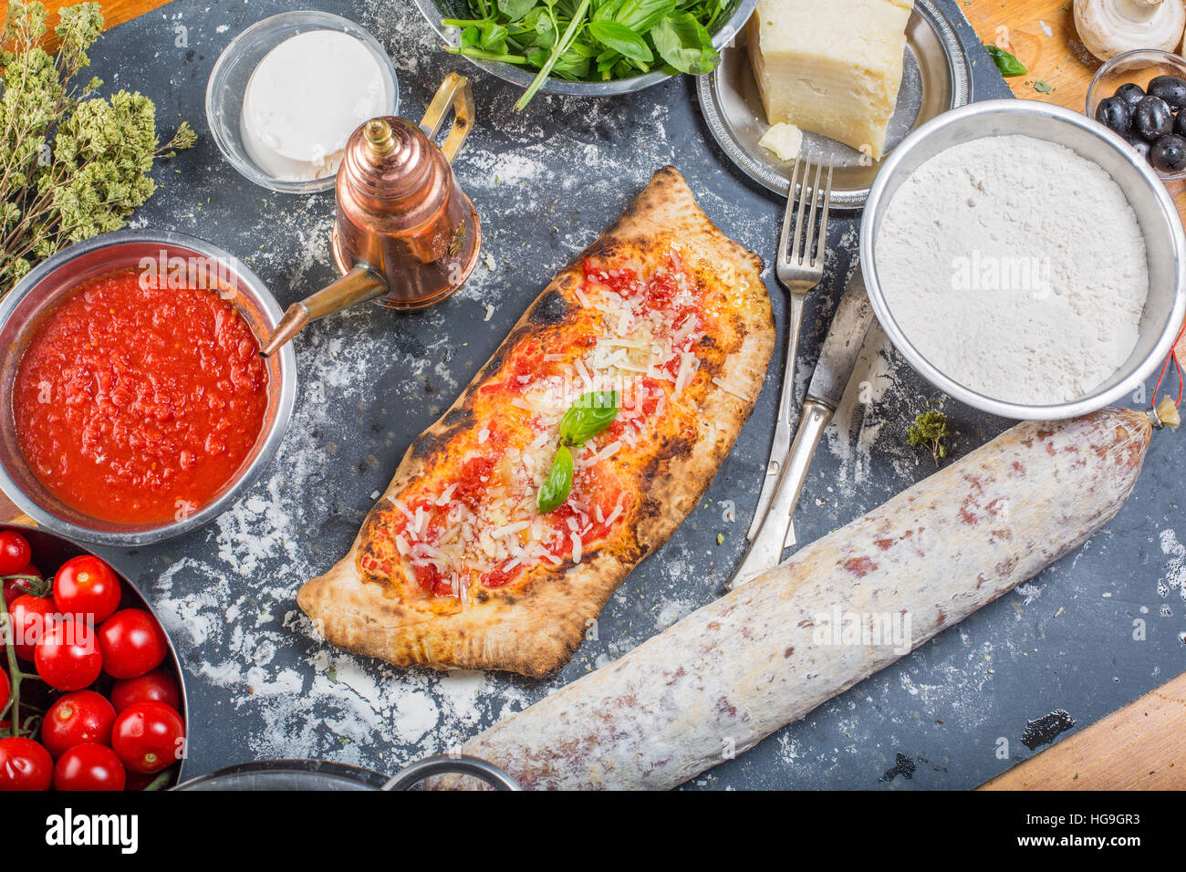 Traditional calzone italian pizza with tomato sauce, mozzarella and ...