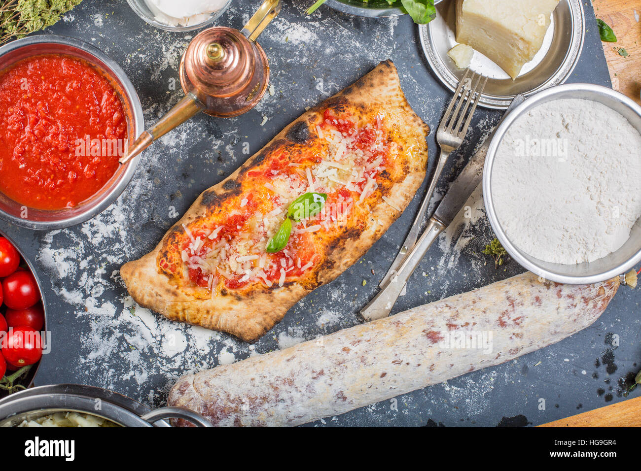 Traditional calzone italian pizza with tomato sauce, mozzarella and ...