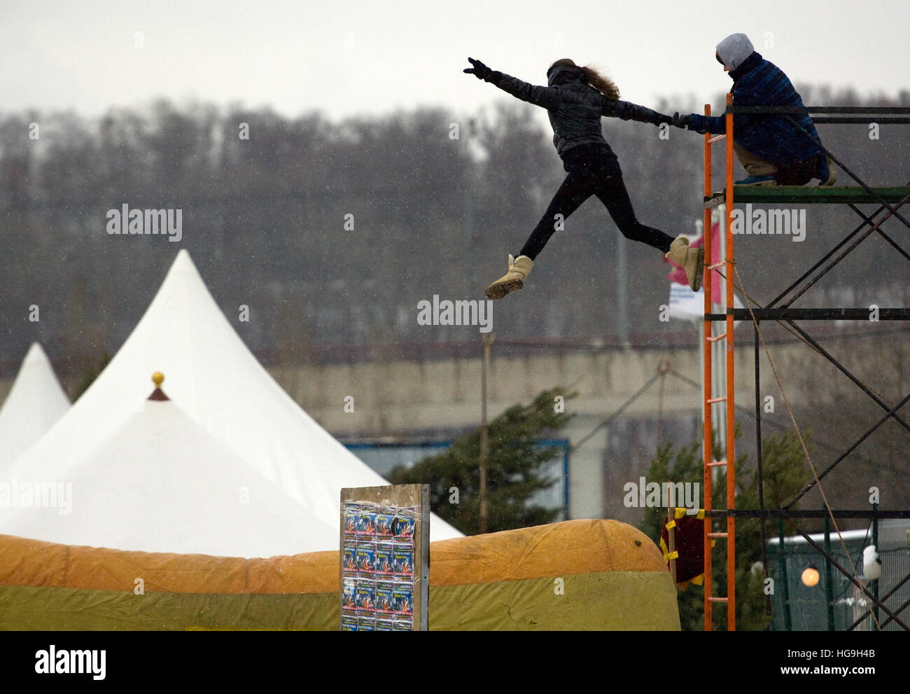 MOSCOW, RUSSIA - NOVEMBER 10, 2016: Unidentified people jump from tower ...