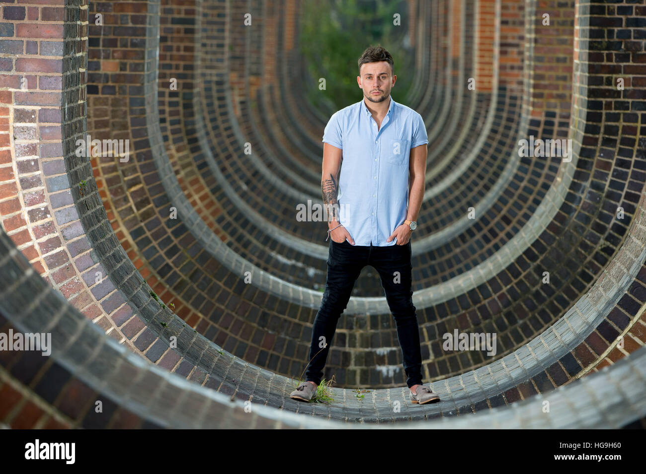 Singer, songwriter Jamie Mathias poses with his guitar for a shoot at ...