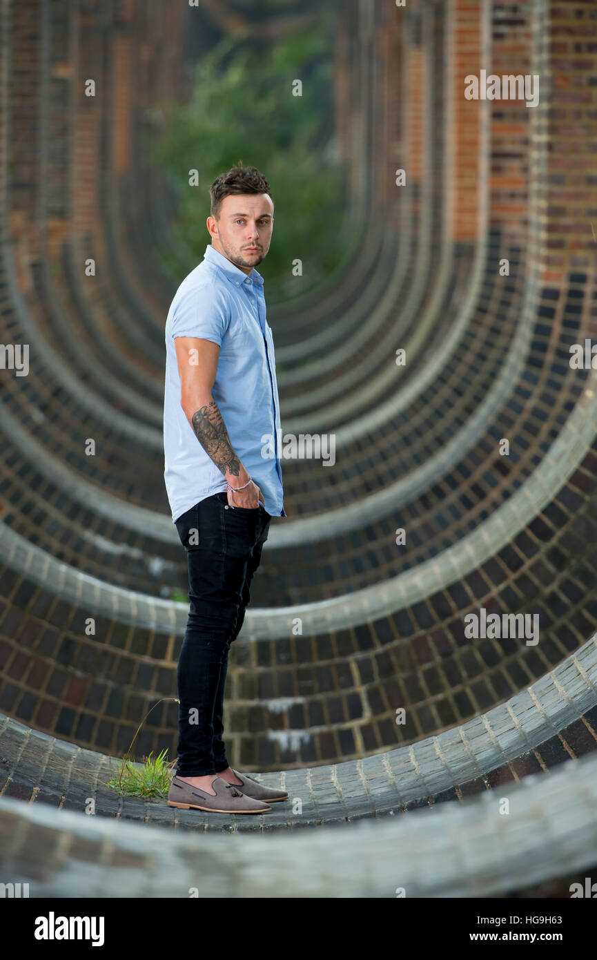 Singer, songwriter Jamie Mathias poses with his guitar for a shoot at ...